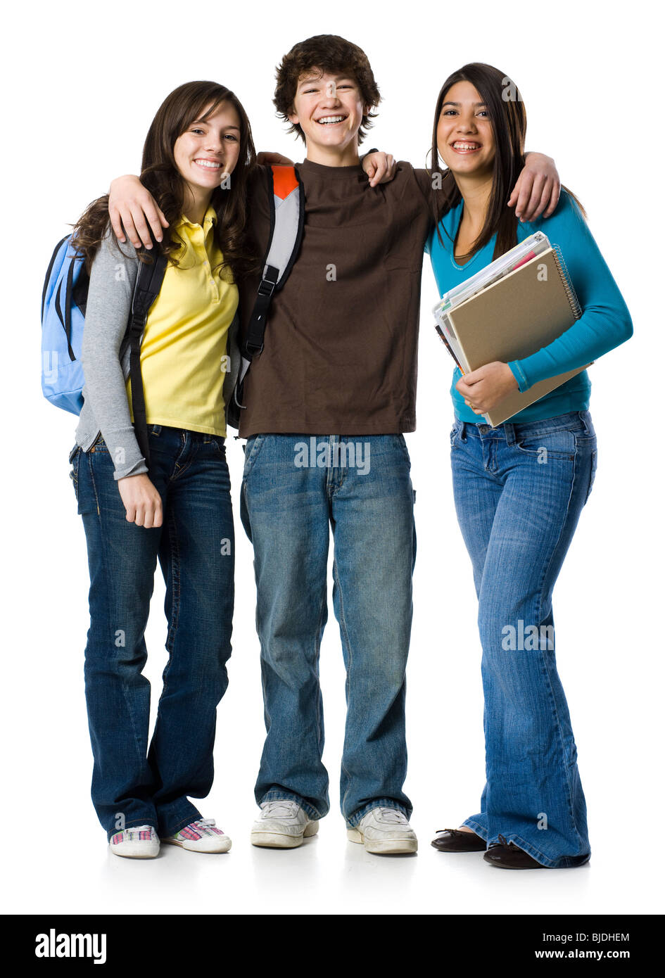 Students with book bags posing Stock Photo - Alamy
