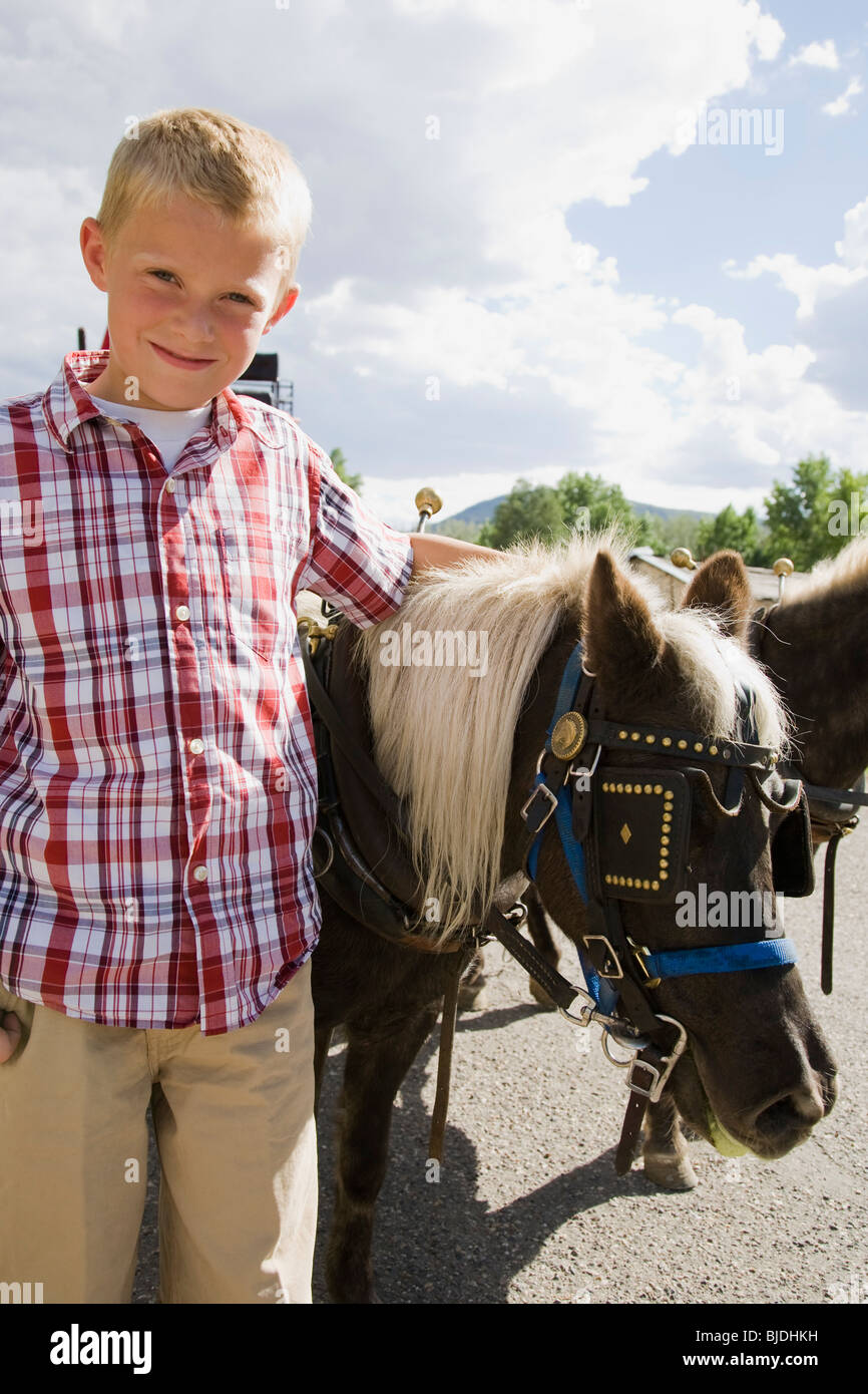 boy with pony Stock Photo - Alamy