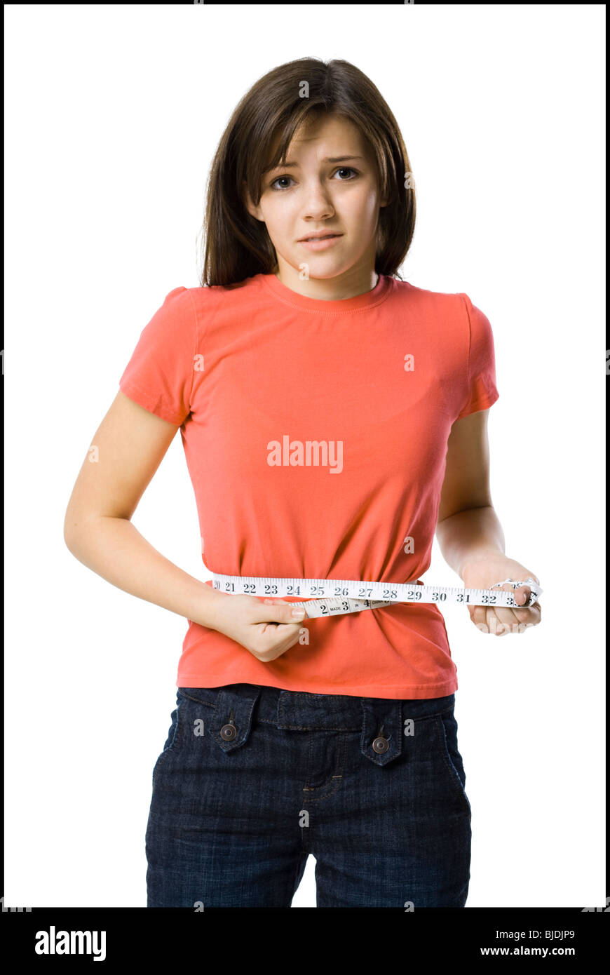 young woman with a measuring tape Stock Photo - Alamy