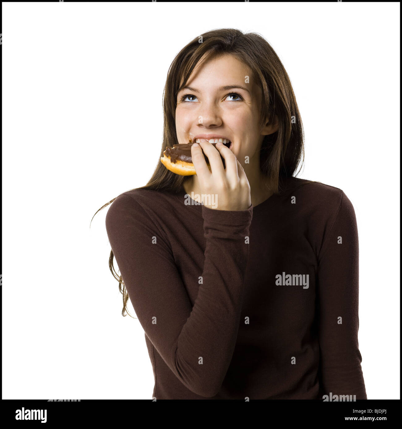 young woman eating junk food Stock Photo - Alamy