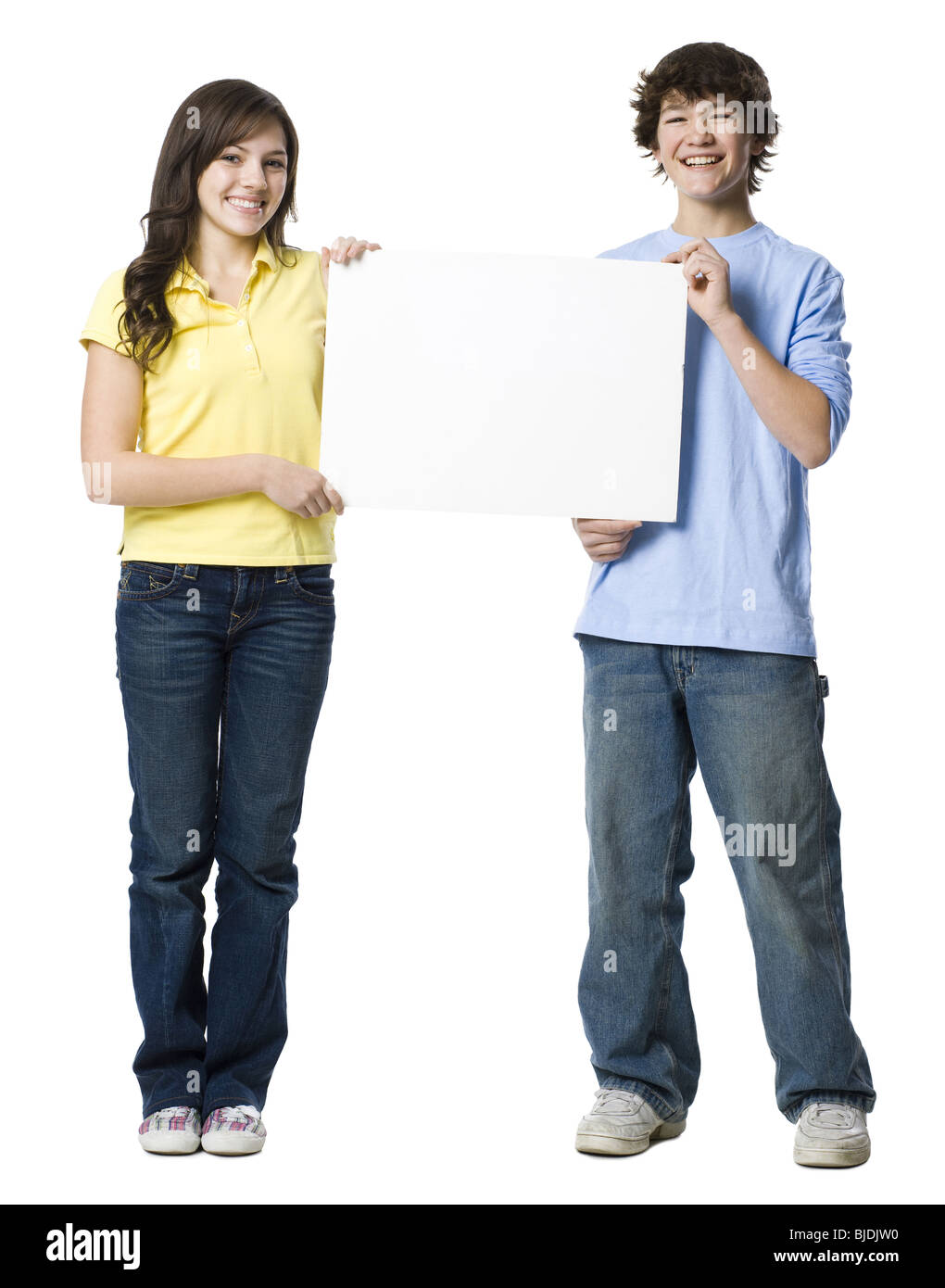 young couple holding a sign Stock Photo - Alamy