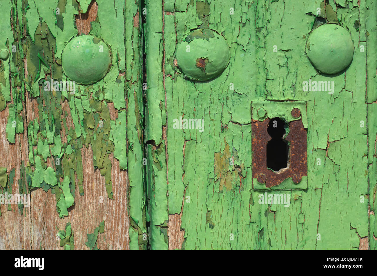 Old lock in a wooden outside spanish door Stock Photo - Alamy