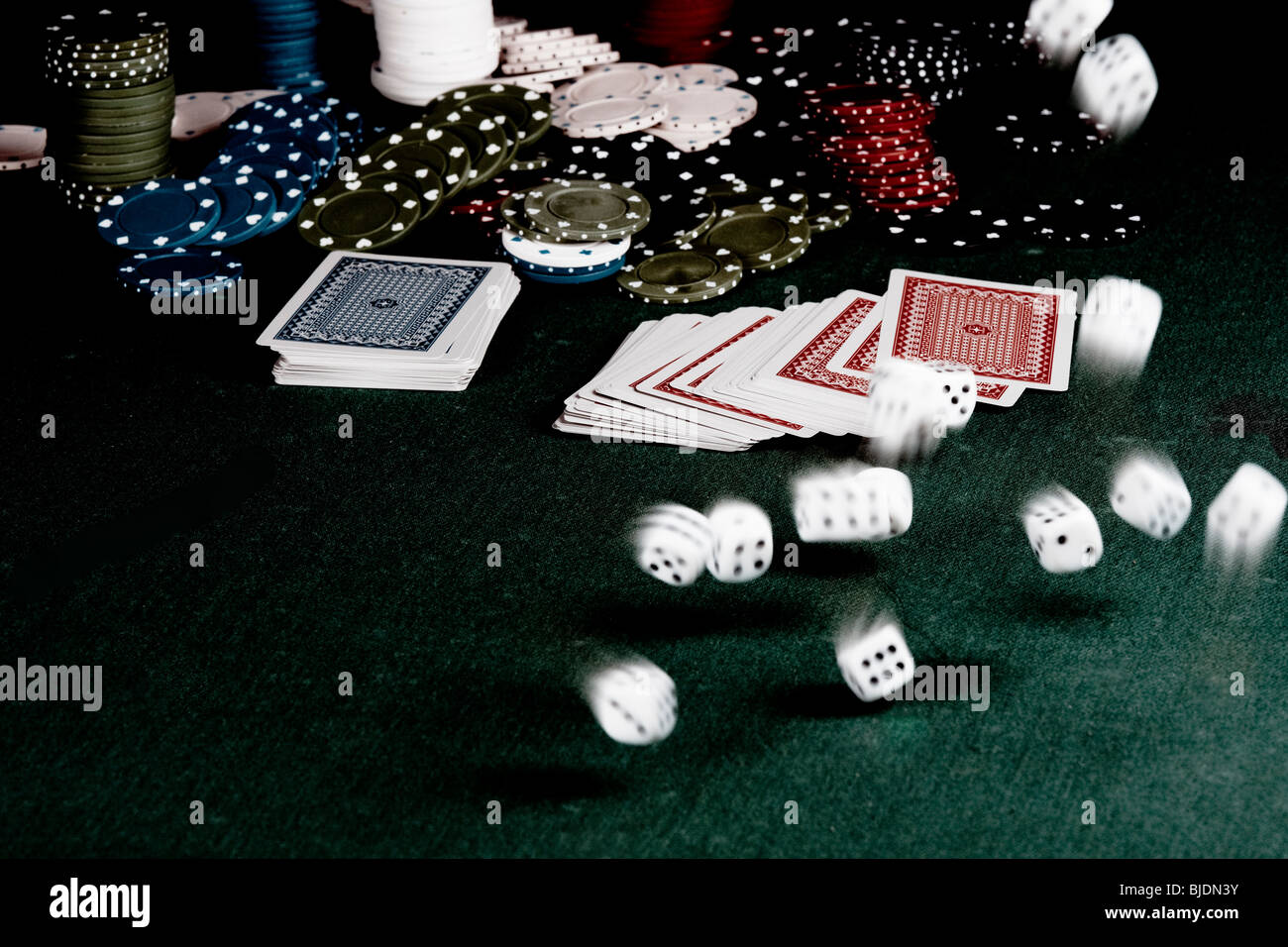 Playing cubes in motion Stock Photo - Alamy