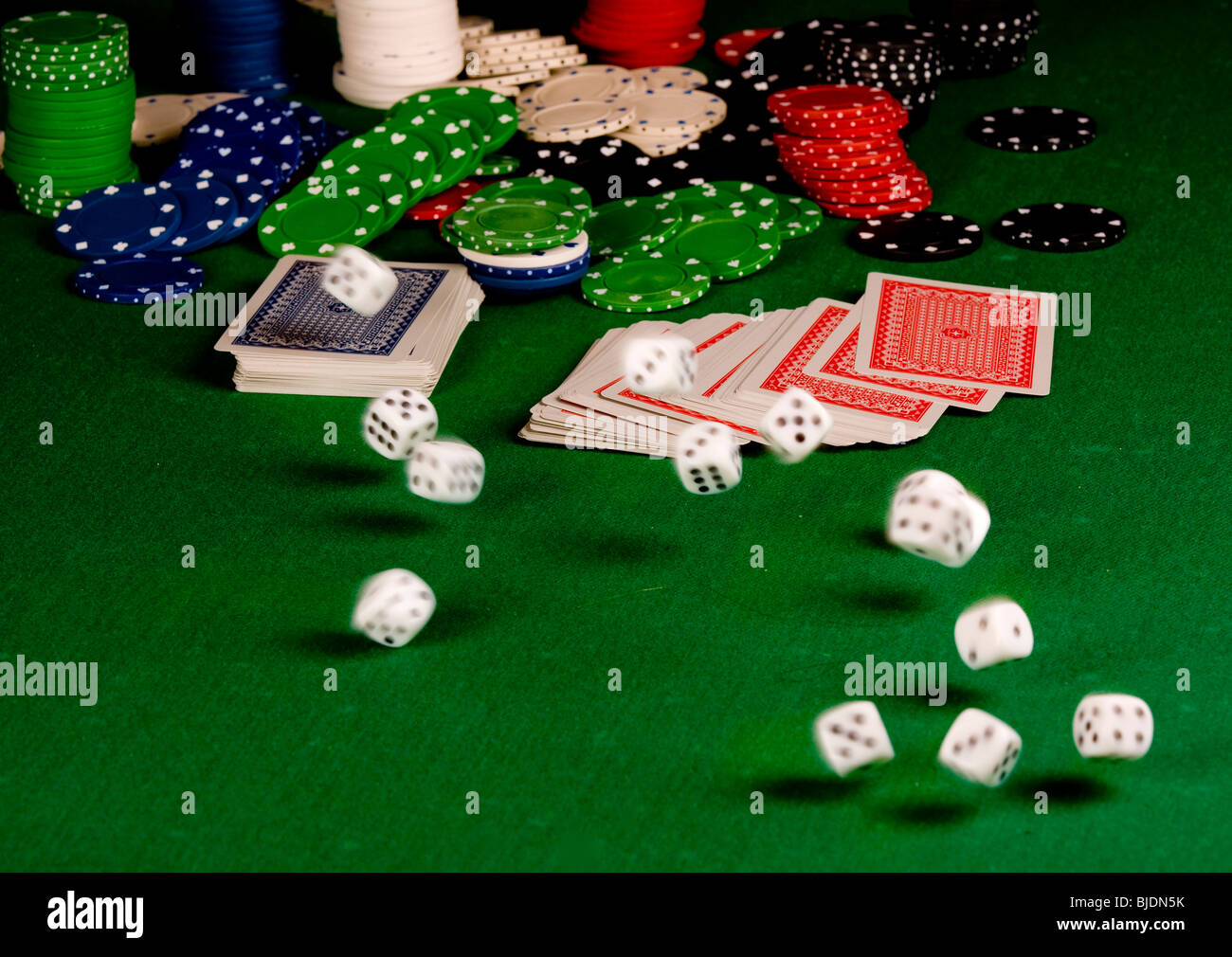 Playing cubes in motion Stock Photo - Alamy