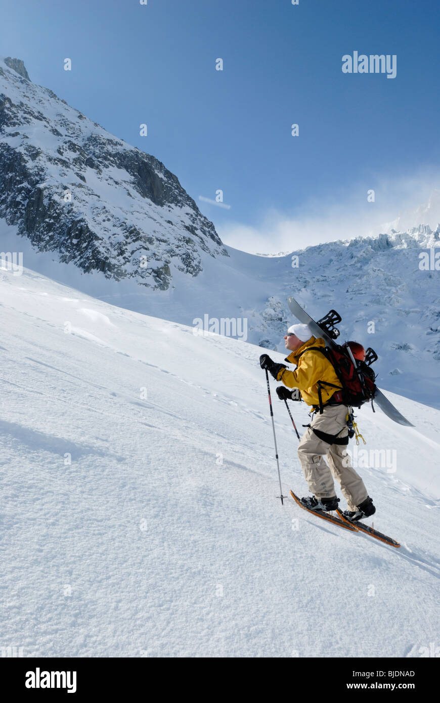 Man walking with snowboard, Vallee Blanche, Chamonix, France Stock ...
