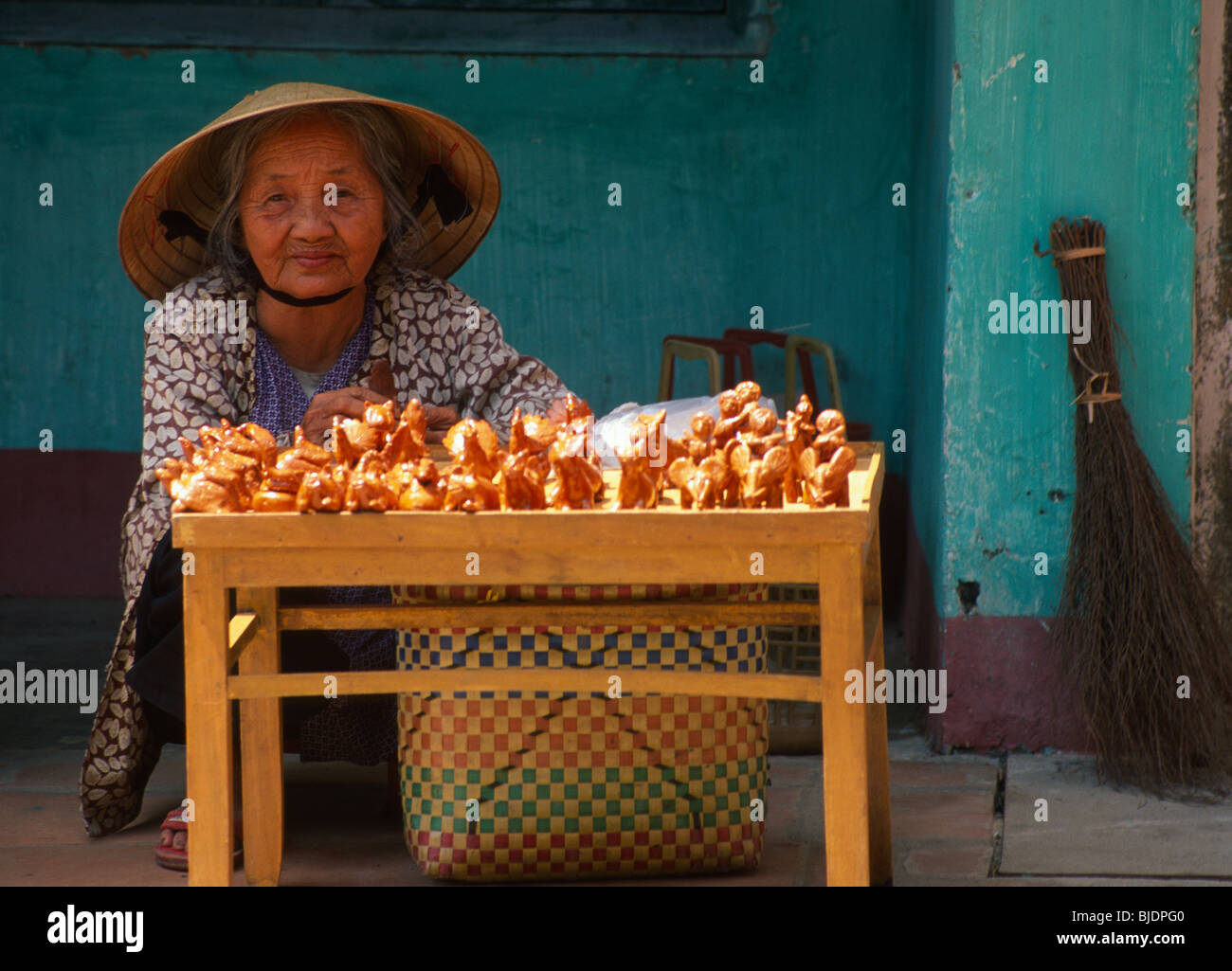 Old Woman selling souvenirs Stock Photo - Alamy