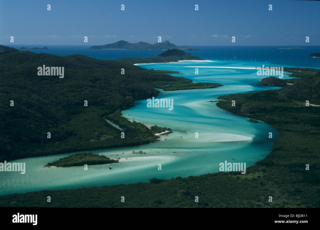 Aerial view of the beautiful sand river Hill Inlet going down to Cid ...