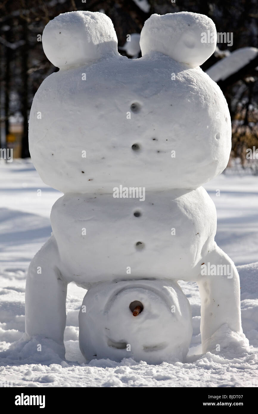 Snowman upside down Stock Photo - Alamy