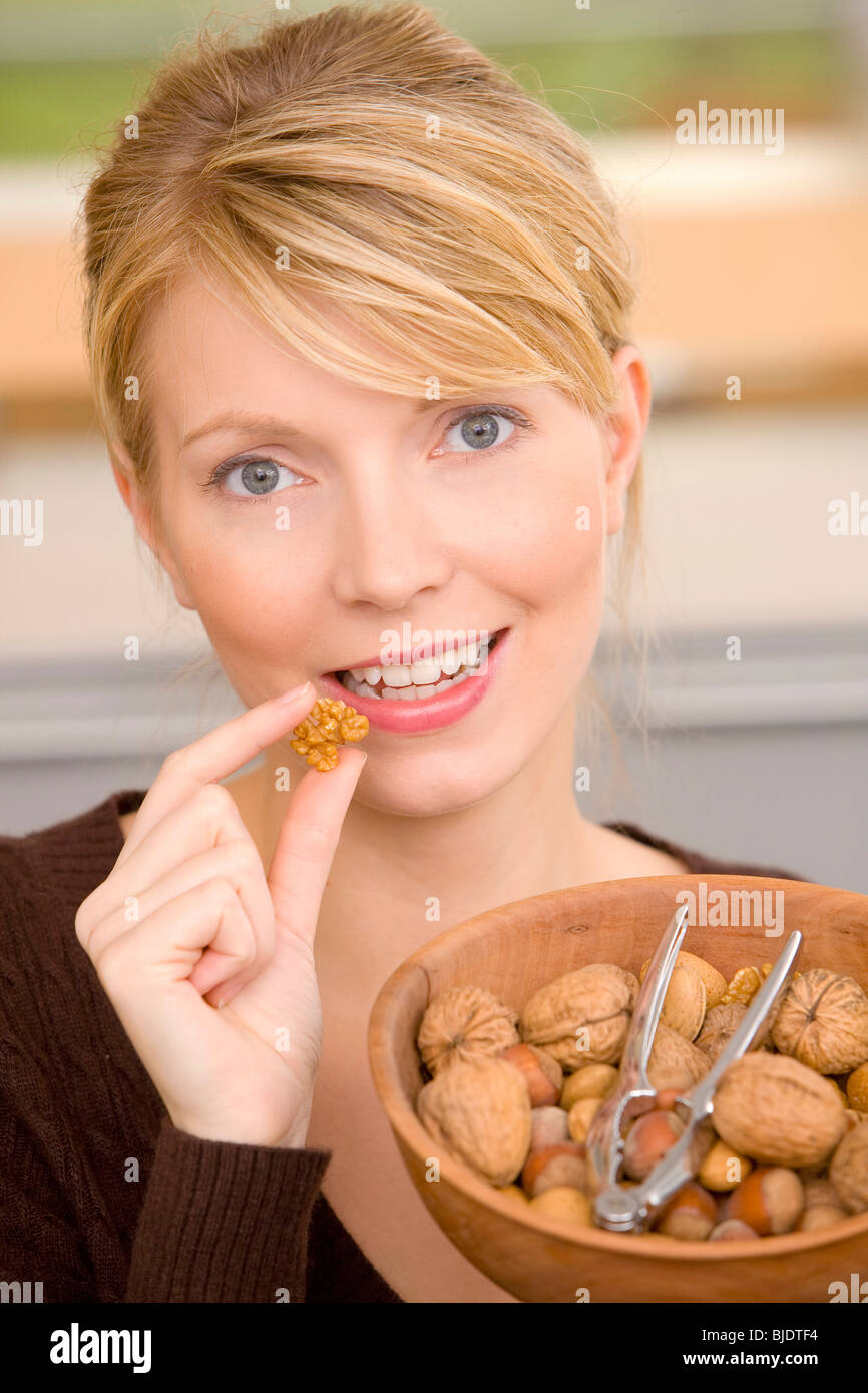 Walnuts almond nuts woman hi-res stock photography and images - Alamy