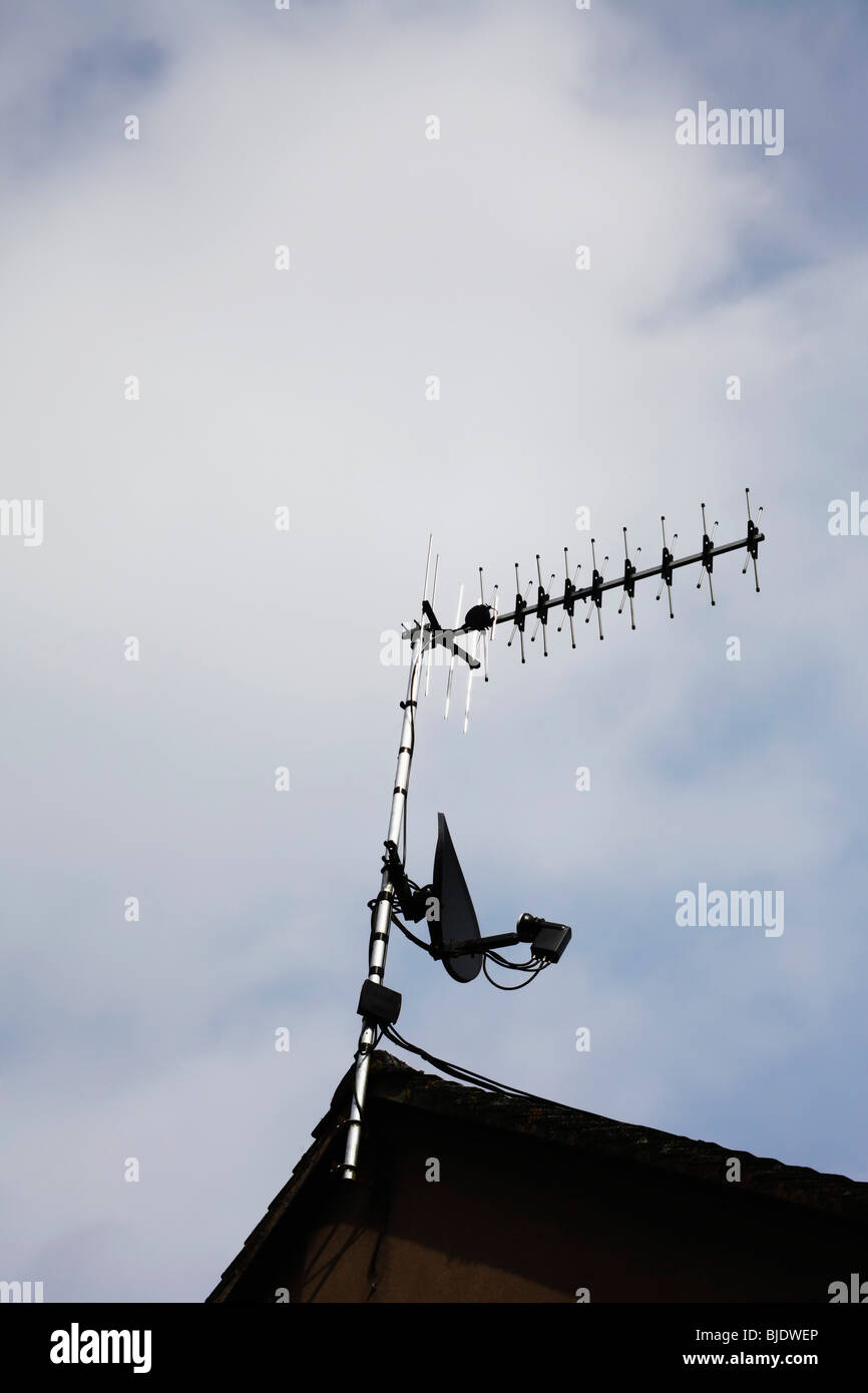 A satellite digital television arial on a roof Stock Photo - Alamy