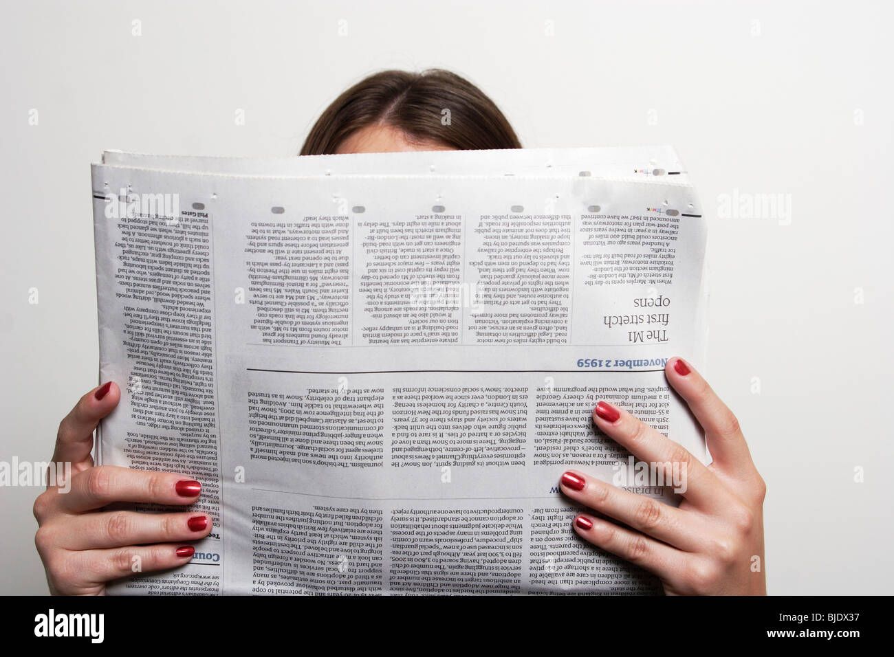 woman reading newspaper Stock Photo - Alamy