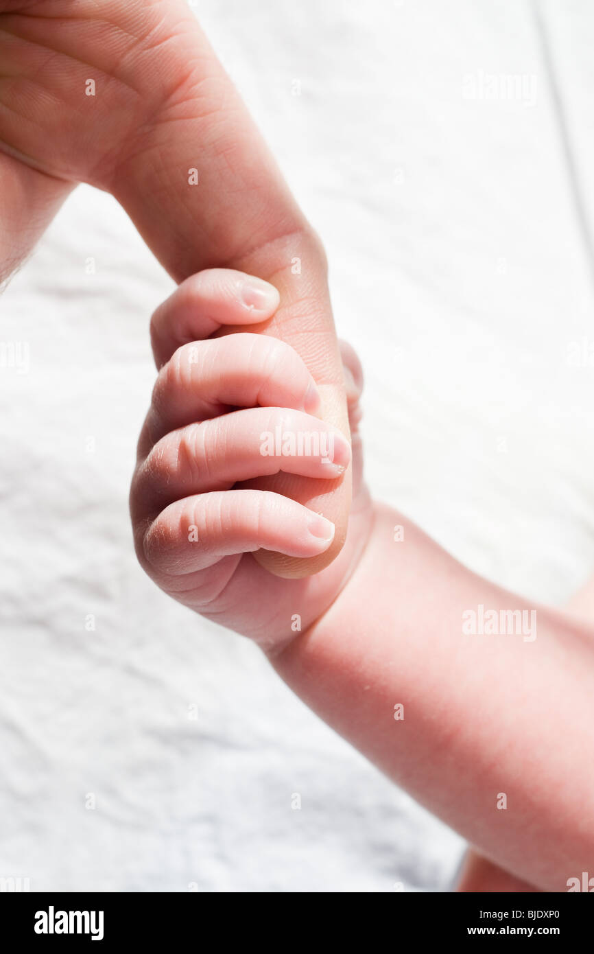 Baby Grasp Finger High Resolution Stock Photography and Images - Alamy