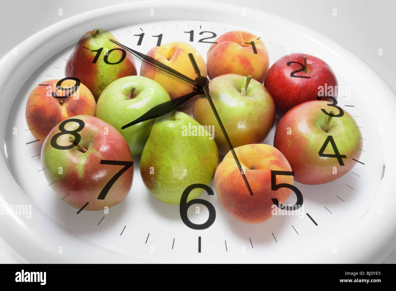 Fruits and Clock Stock Photo - Alamy