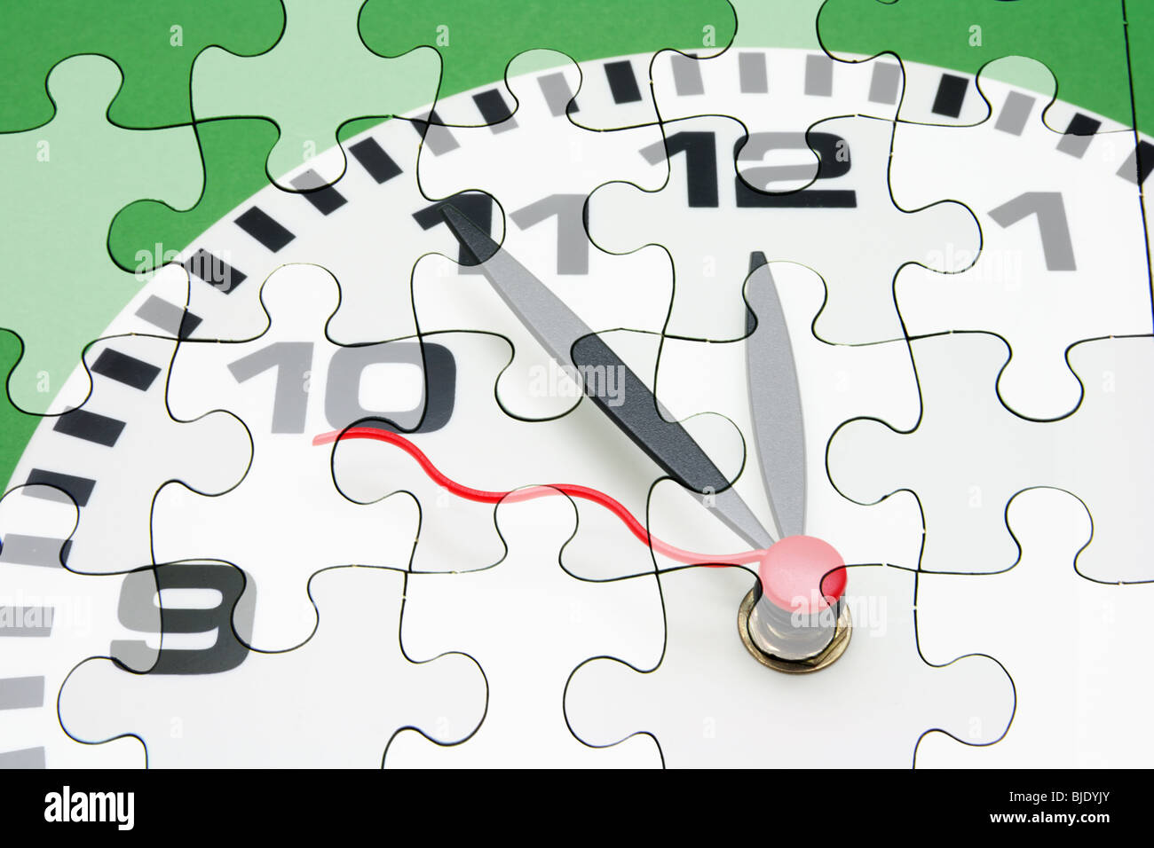 Clock and Jigsaw Puzzle Stock Photo - Alamy