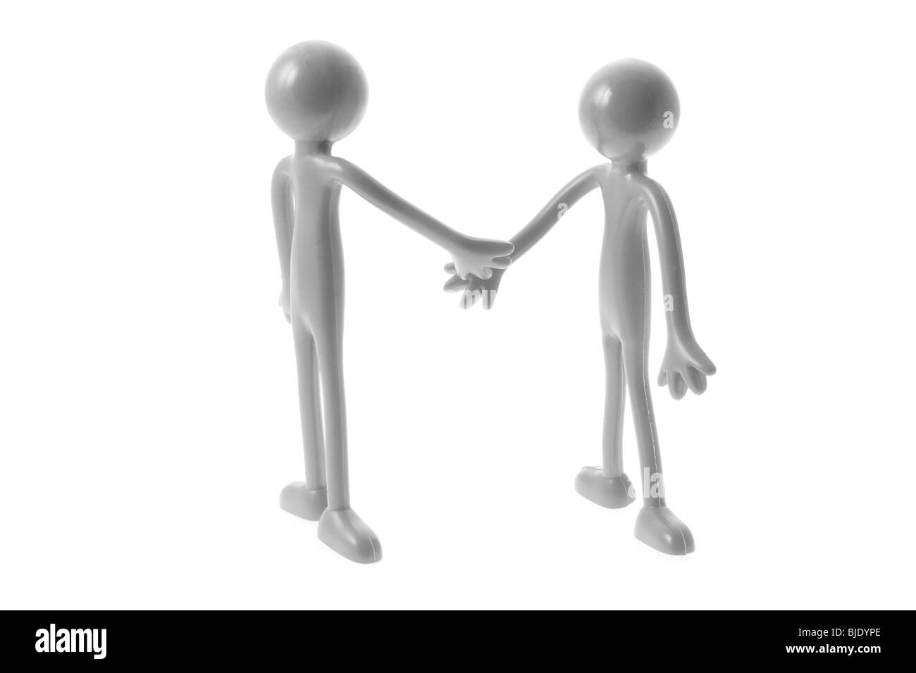 Rubber Figures Shaking Hands Stock Photo - Alamy