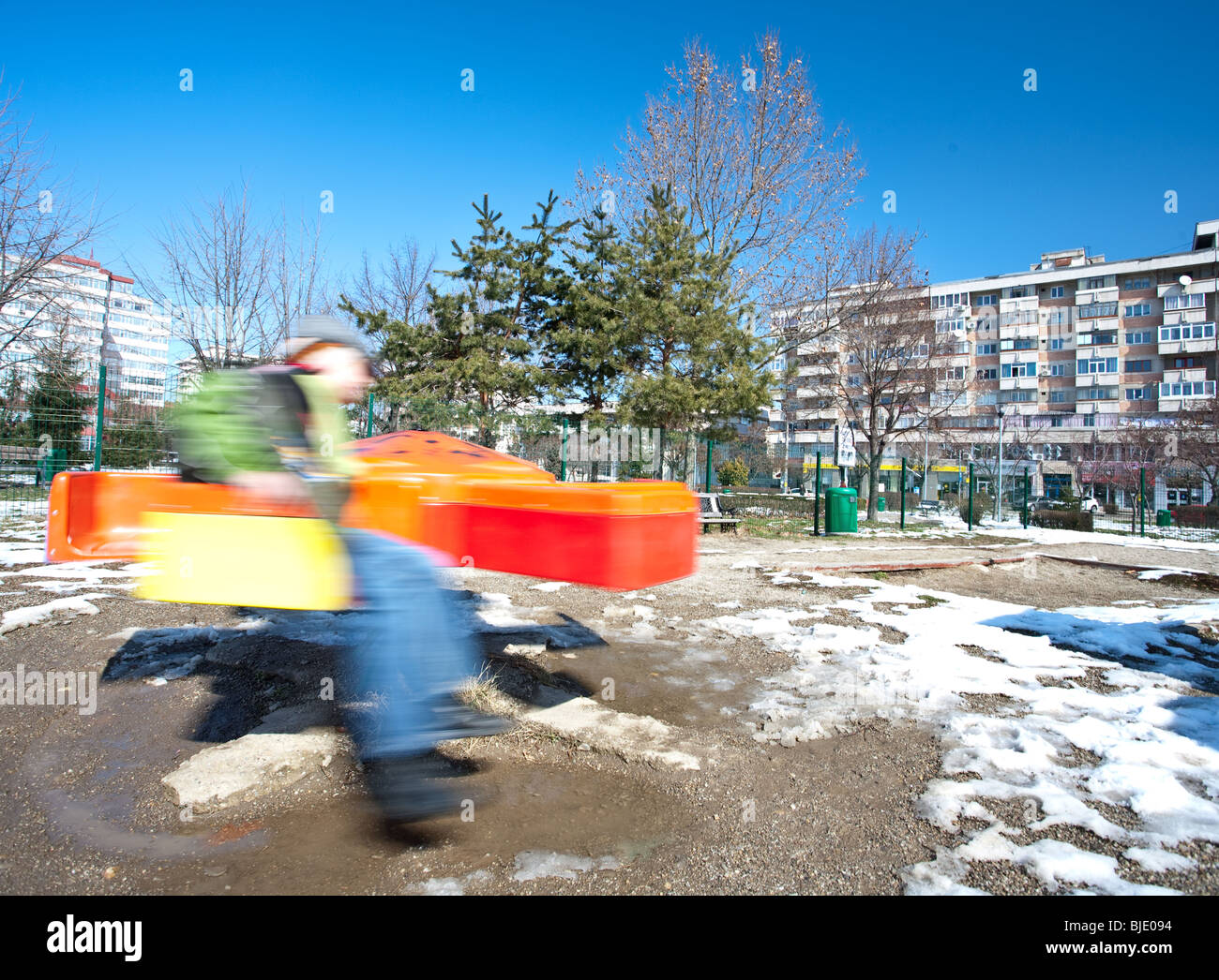 Child spinning in a carousel Stock Photo - Alamy