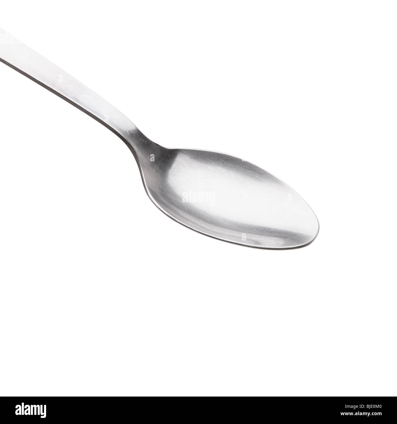 Empty stainless steel spoon isolated against white background including ...