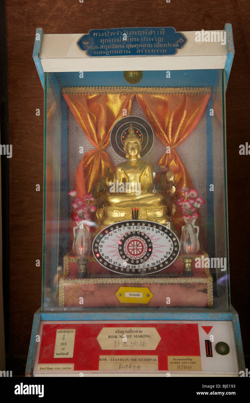 Buddha wish vending machine Stock Photo - Alamy