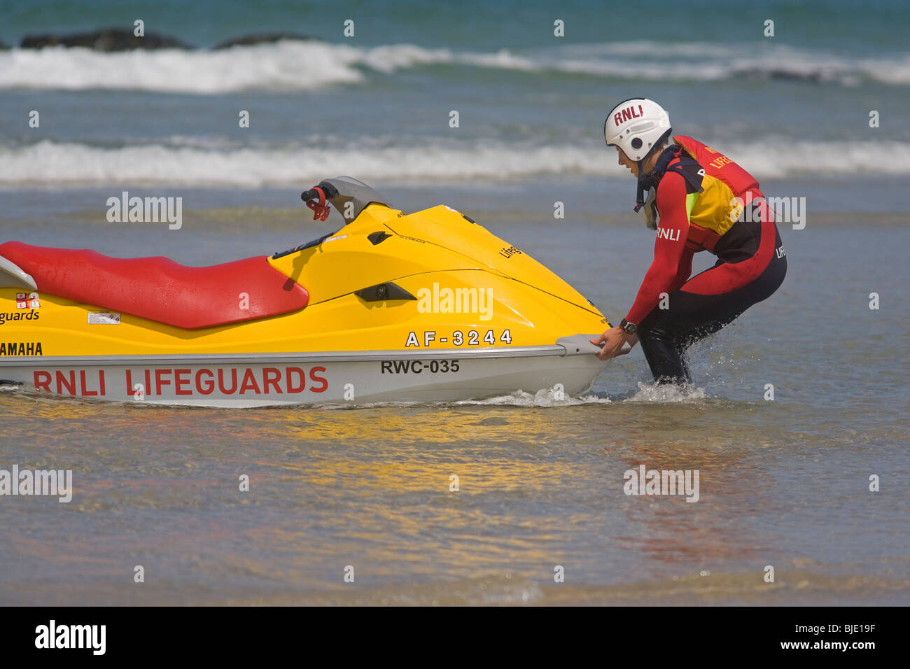 RNLI lifeguard at Gwithian beach Cornwall Stock Photo - Alamy
