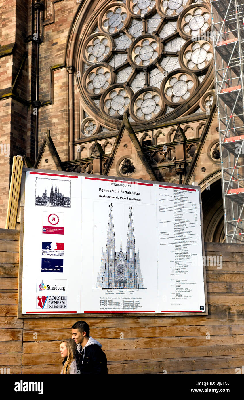 Young couple and information board at St Paul protestant church ...