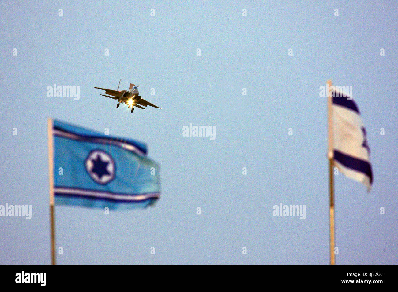 Israeli Air force F-15I Fighter jet in flight Israeli and IAF flags in ...