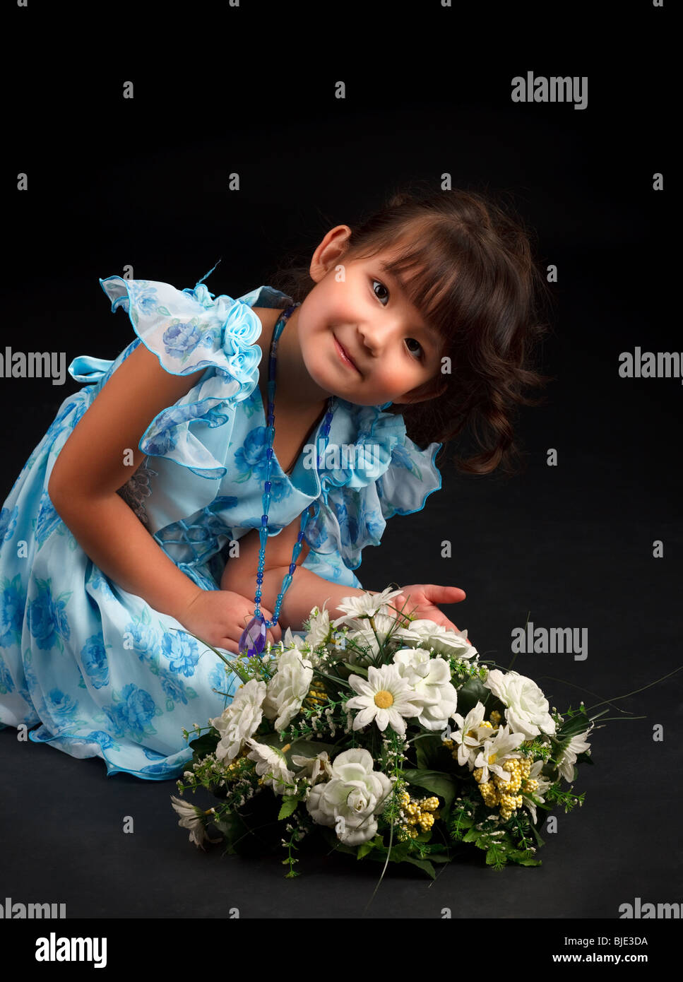 Little fashion model posin in studio Stock Photo - Alamy