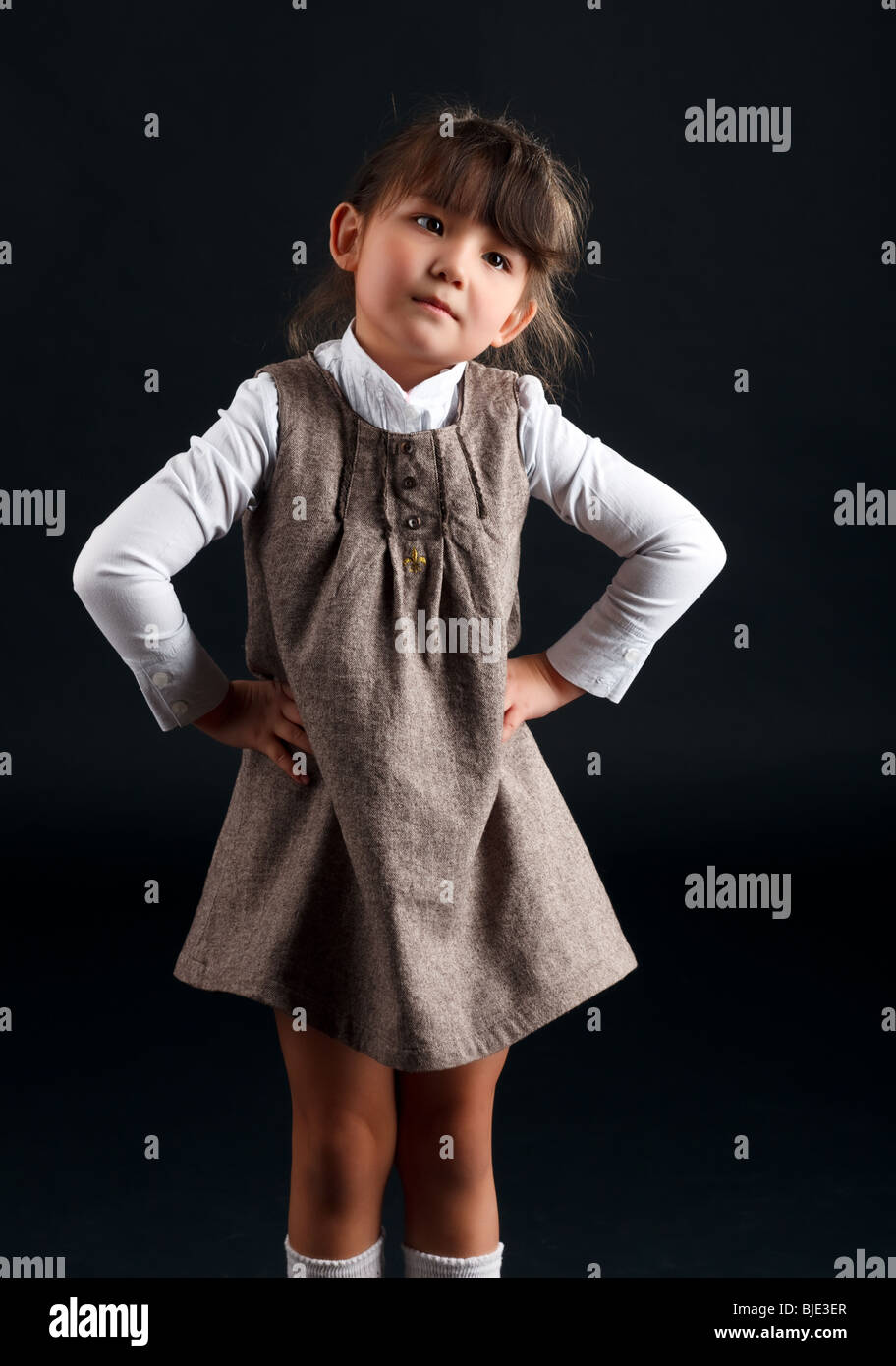 Little fashion model posin in studio Stock Photo - Alamy