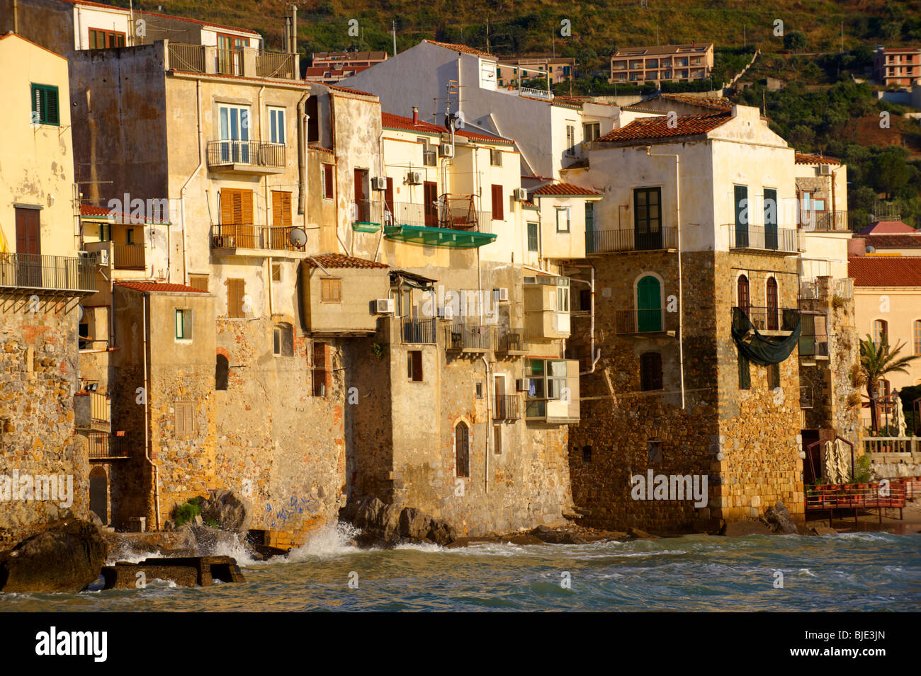 Medieval houses and seafront of old Cefalu [Cefaú] Sicily Stock Photo ...