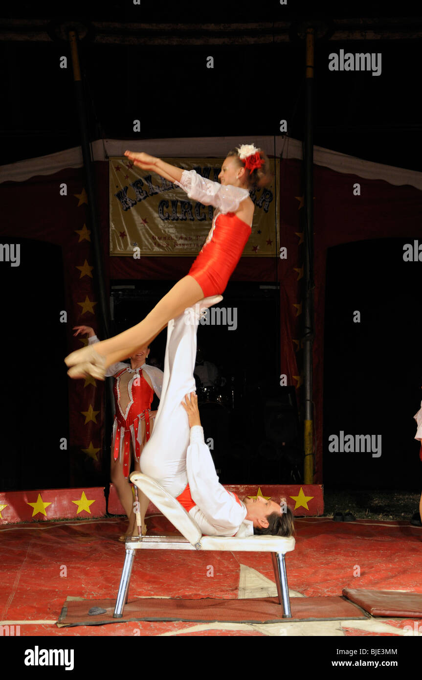Acrobats in circus Stock Photo - Alamy