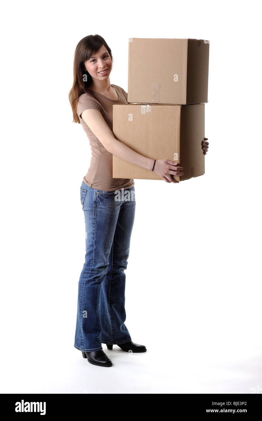 Young female adult holding cardboard boxes on white background Stock ...
