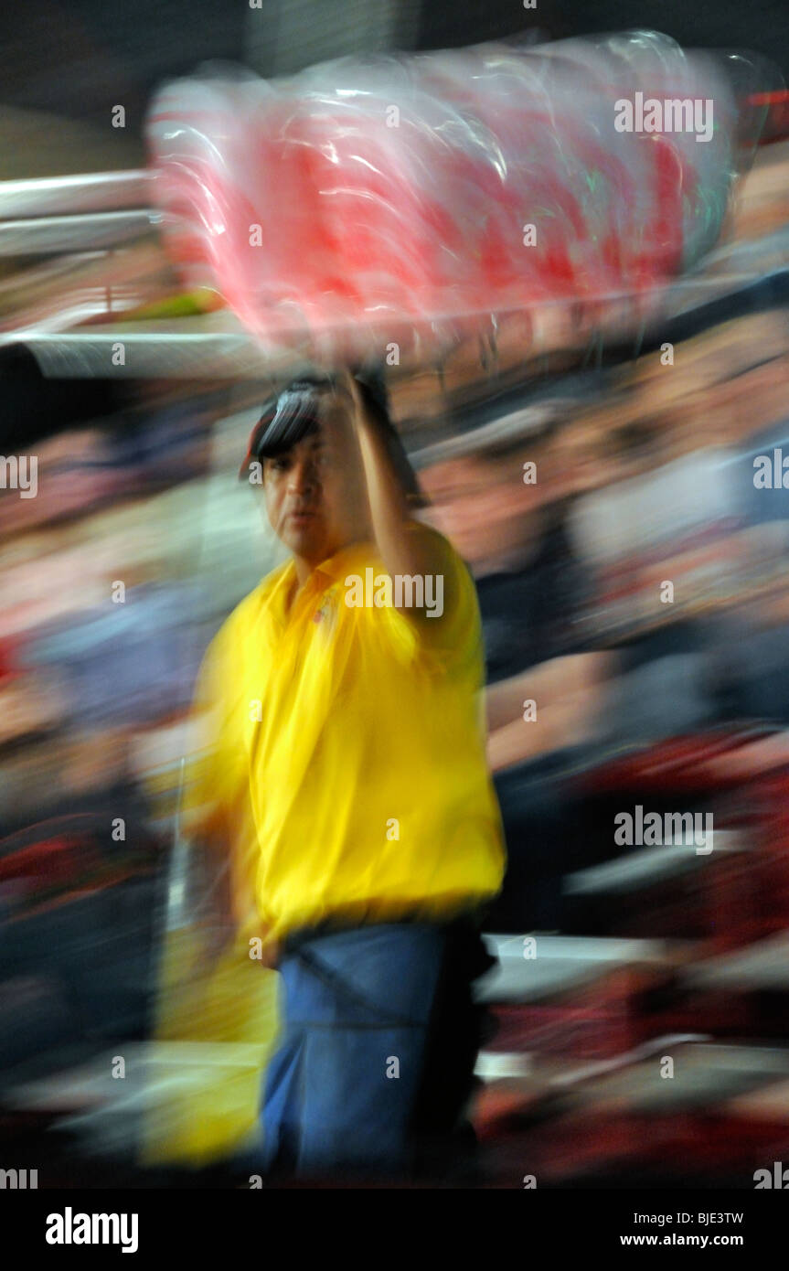 Man selling popcorn at show Stock Photo - Alamy