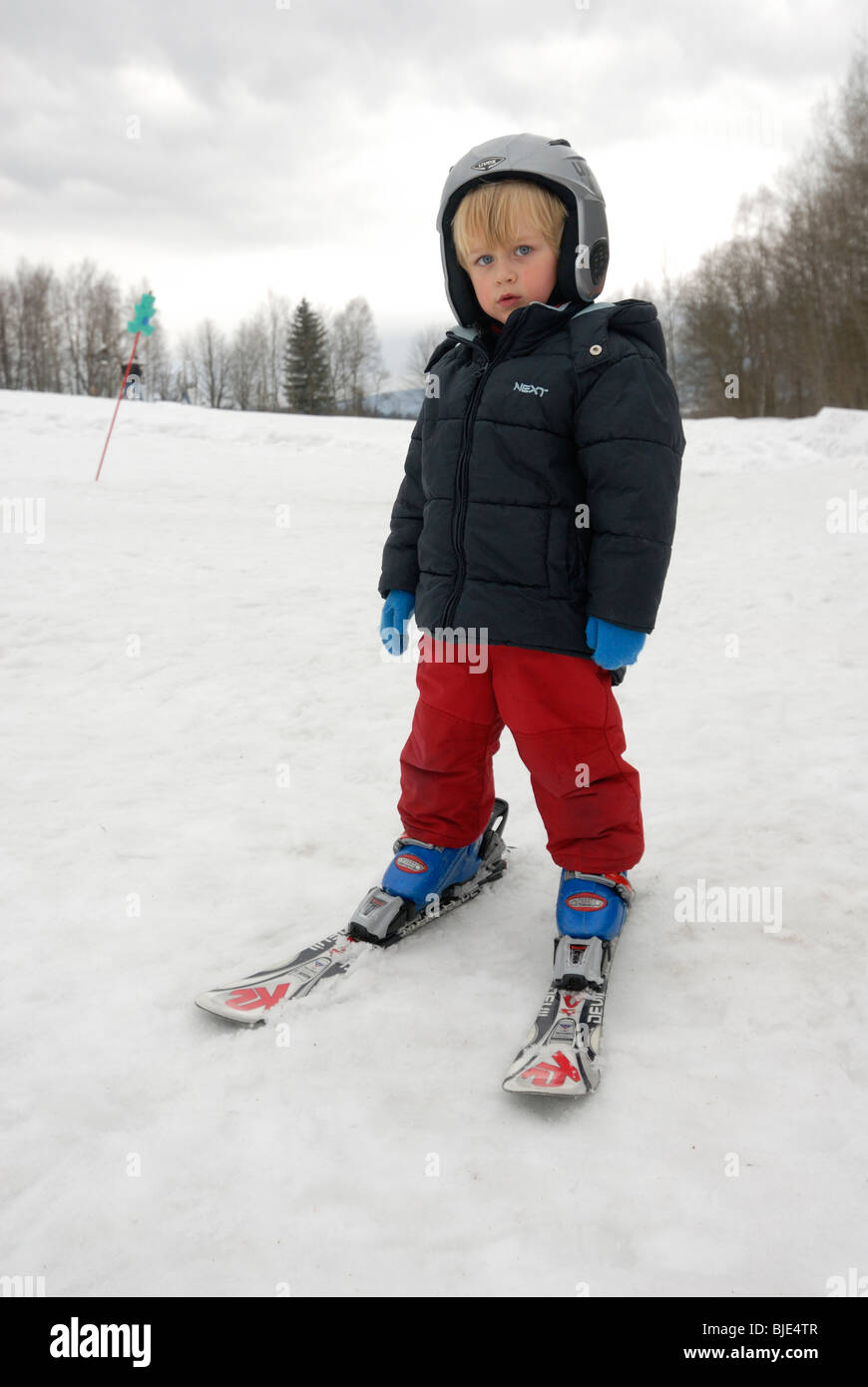 Little Child Learning To Ski Stock Photo - Alamy