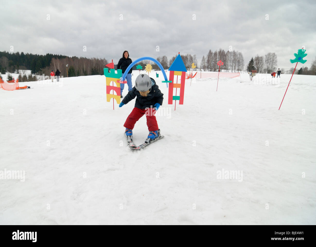 Little Child Learning To Ski Stock Photo - Alamy