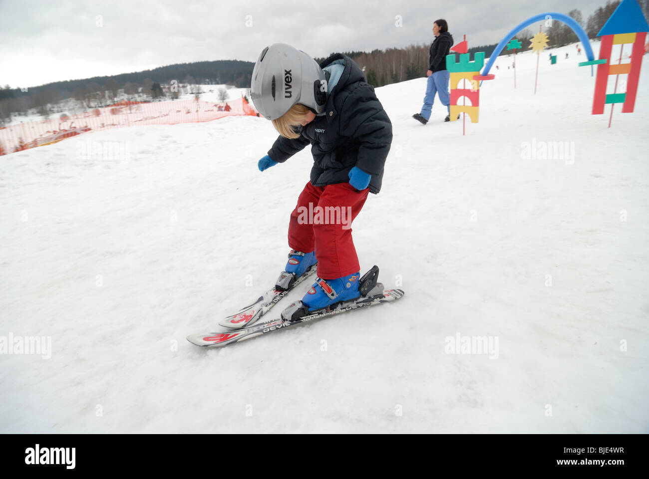 Little Child Learning To Ski Stock Photo - Alamy