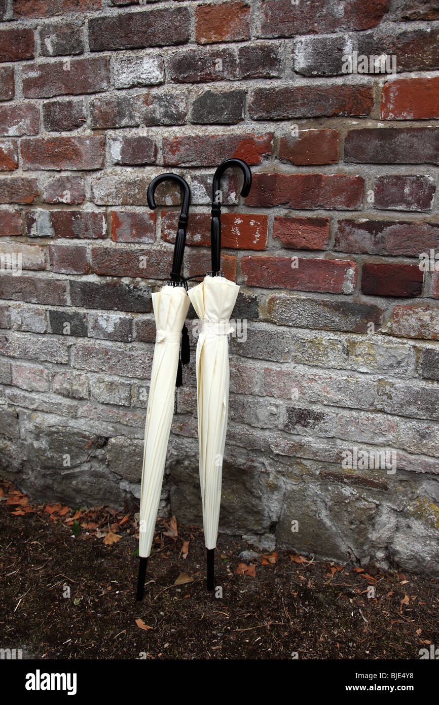 Pair folded umbrellas hi-res stock photography and images - Alamy