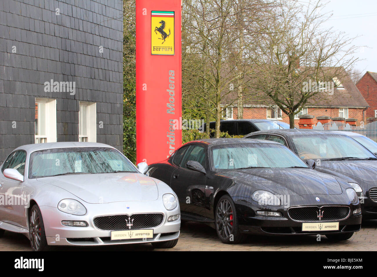 ferrari luxery car garage forecourt cars new forest england Stock Photo ...