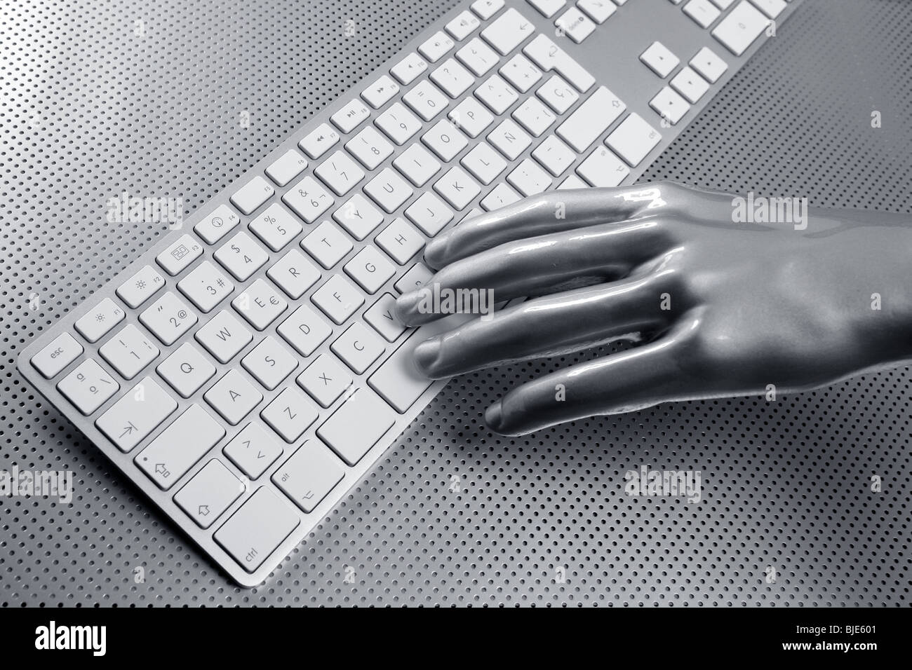 computer keyboard aluminum gray hand silver background Stock Photo - Alamy