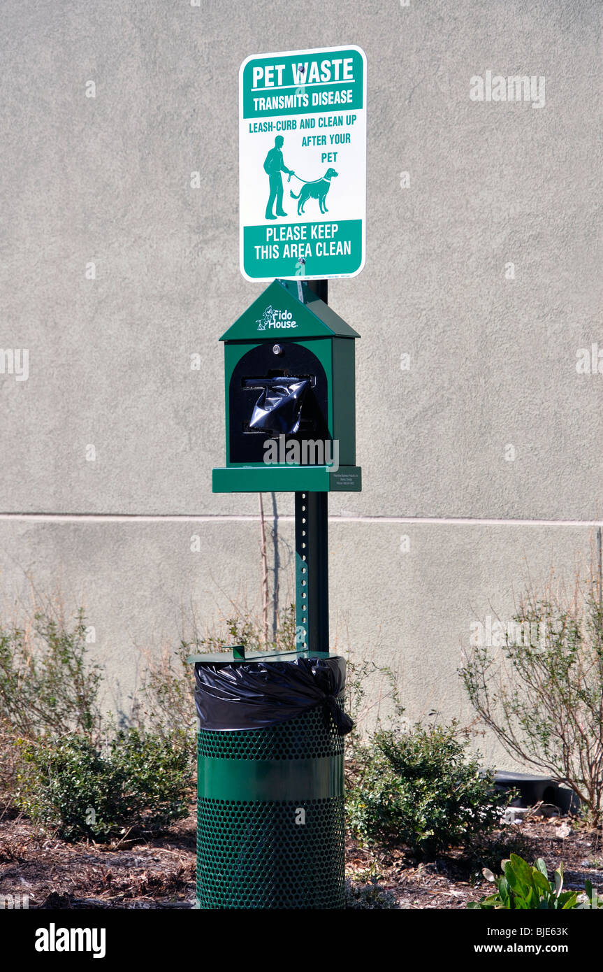 Dog waste bag dispenser Stock Photo - Alamy