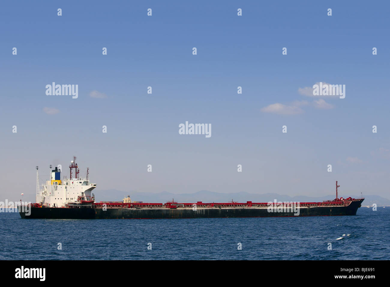 Oil tanker boat over blue Mediterranean sea Stock Photo - Alamy