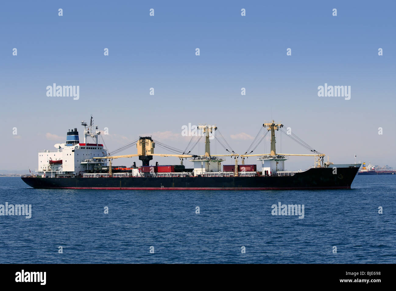 Cargo container freighter ship sailing in Mediterranean sea Stock Photo ...