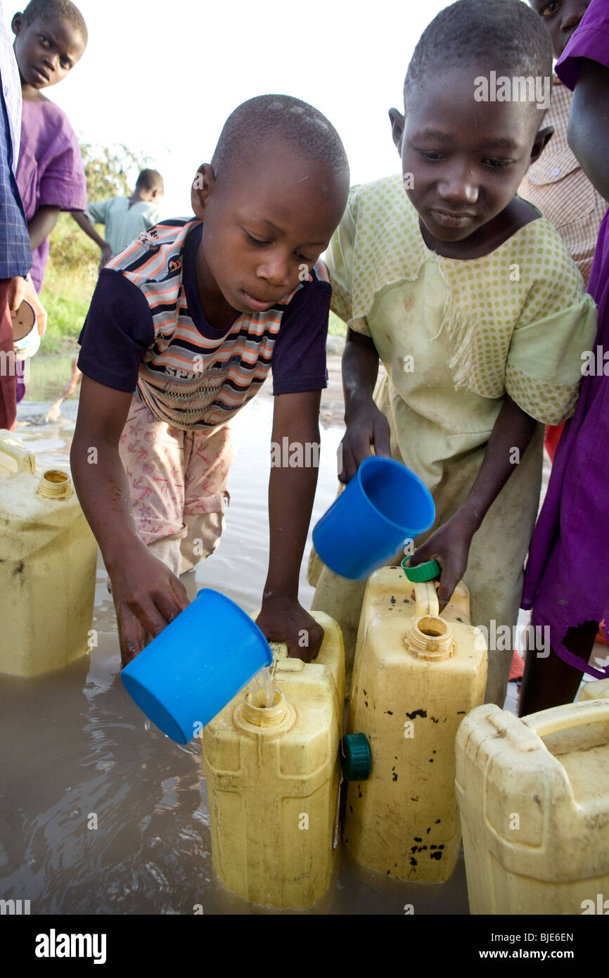 African Child Drinking Clean Water High Resolution Stock Photography ...