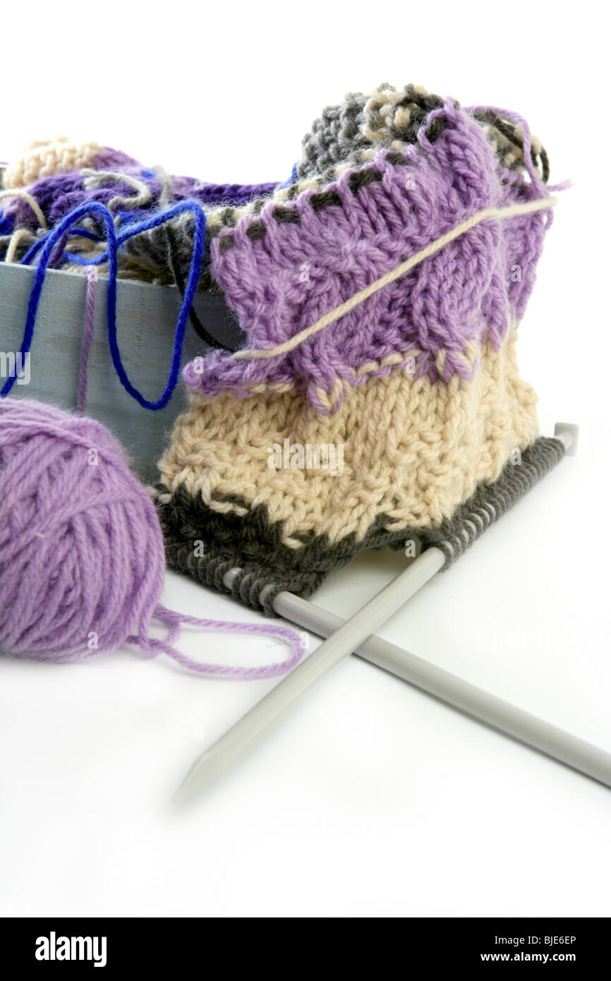 colorful knitting tools with wool thread balls Stock Photo - Alamy