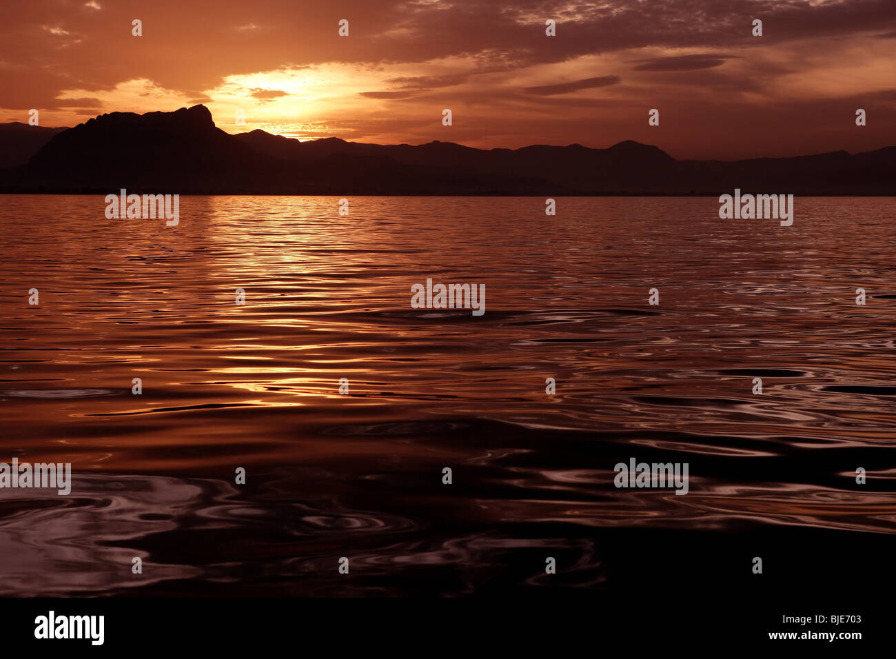 Beautiful seascape ocean sunset reflexion golden sea colors Stock Photo ...