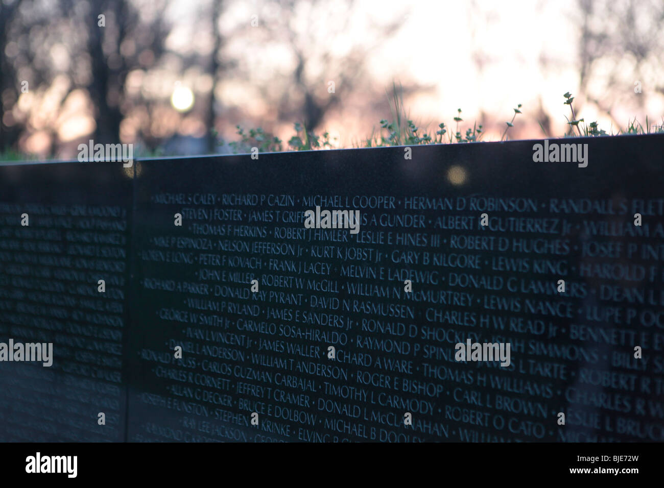 Names on the Vietnam Memorial Wall at Sunset. detail close up Stock ...