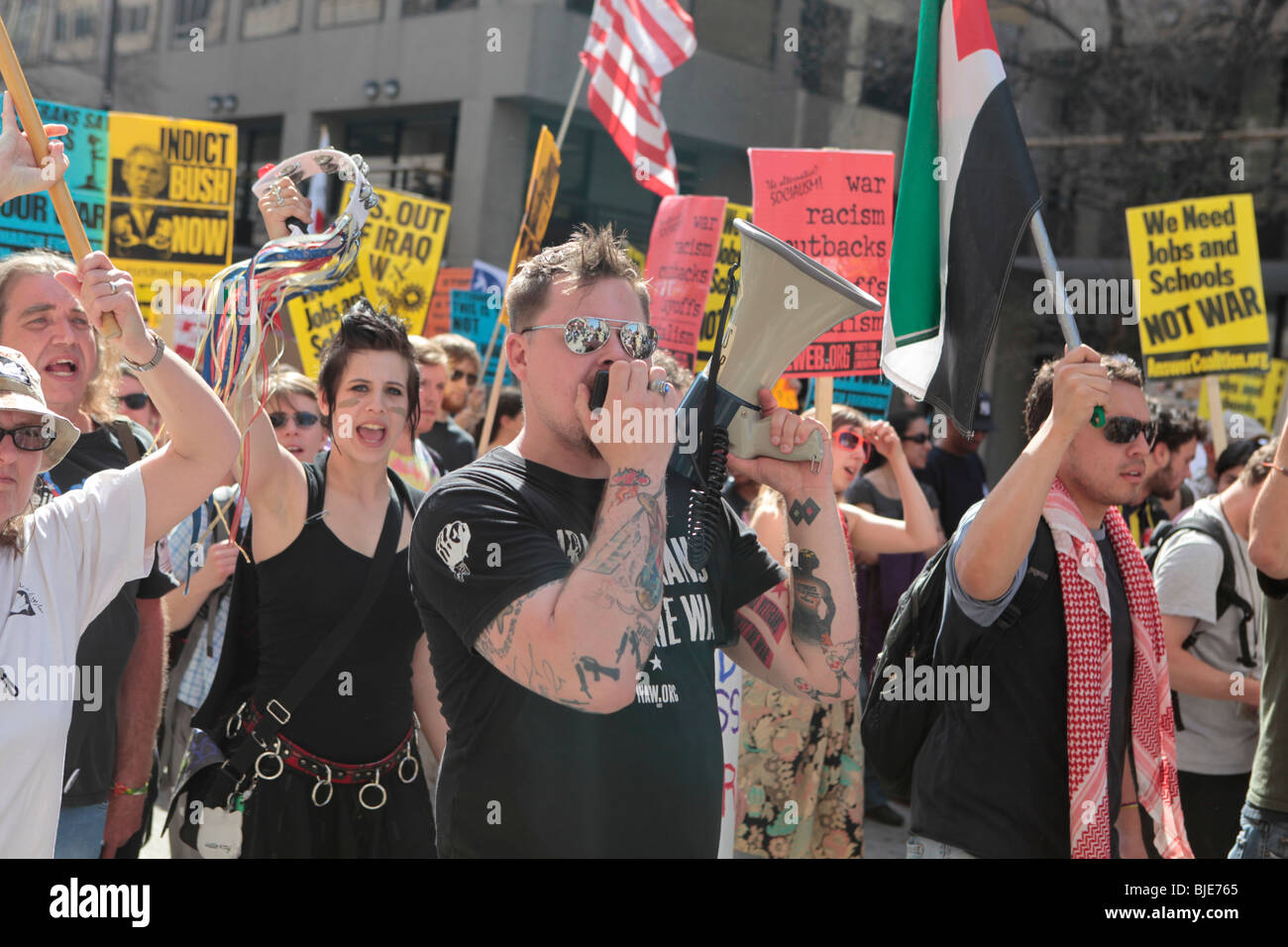Iraq Veterans Against the War marching with sign Anti-war protest ...
