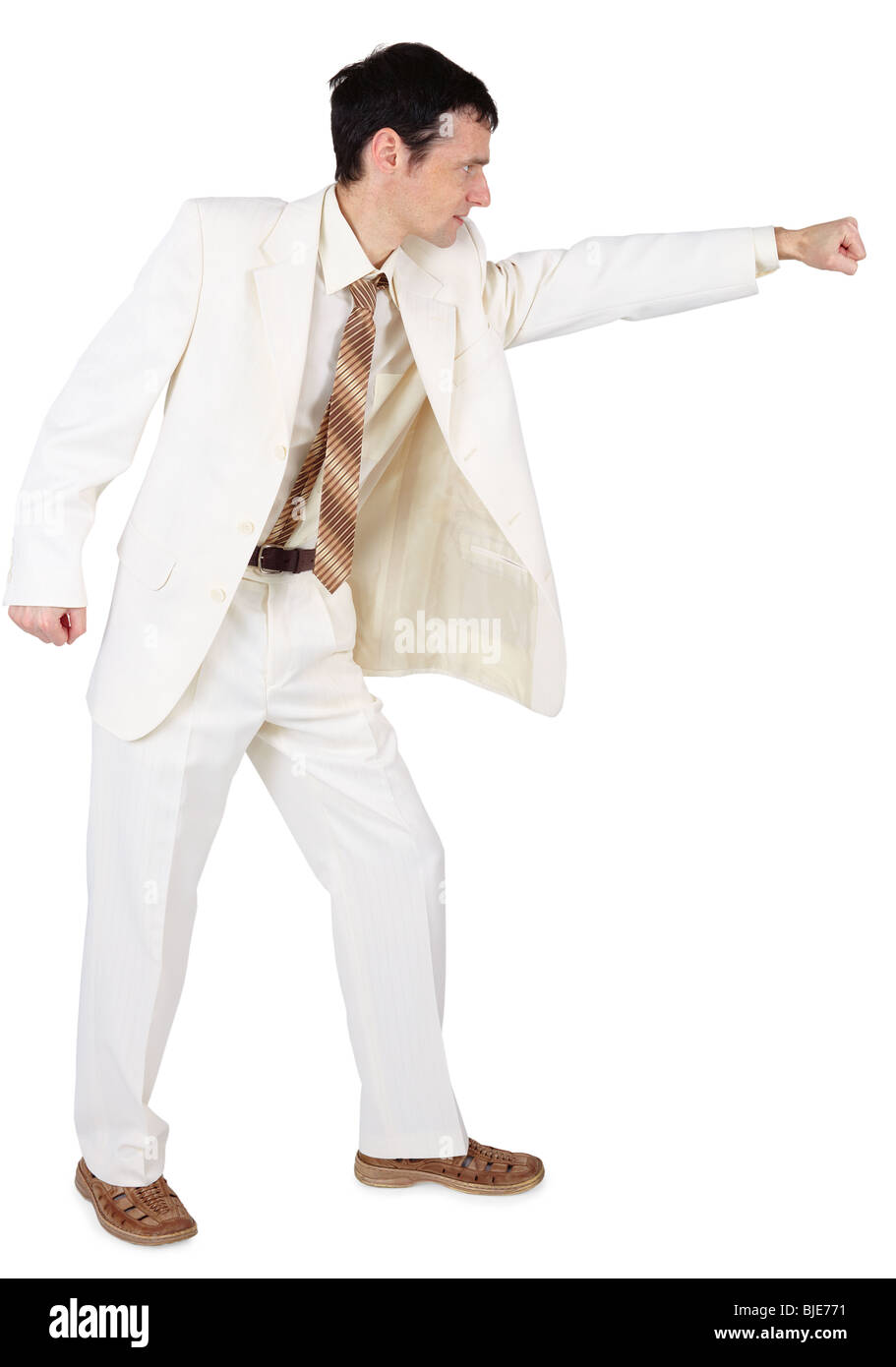 Businessman punching, isolated on a white background Stock Photo - Alamy