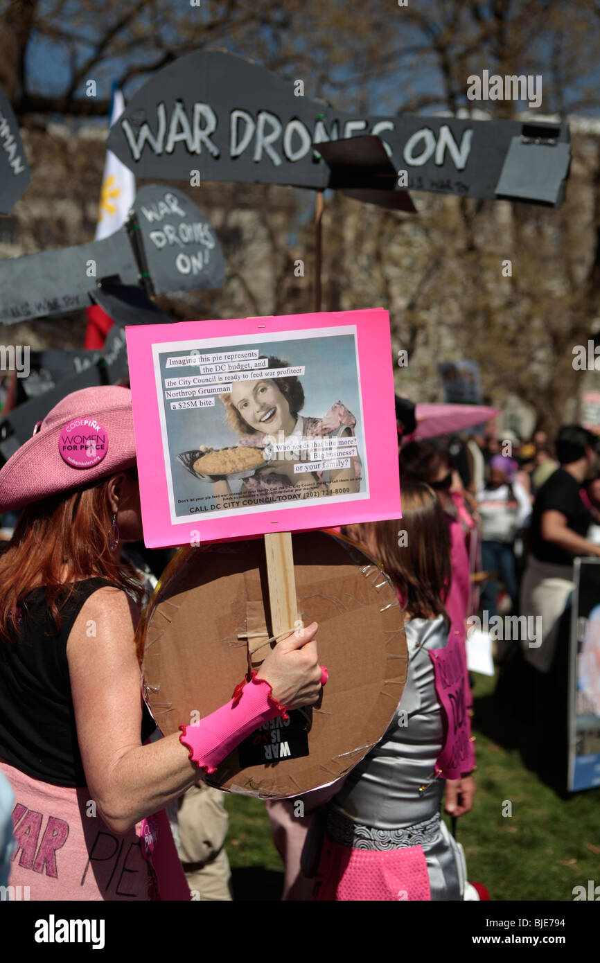 Code pink activist carrying sign. Anti-war protest. March On Washington ...