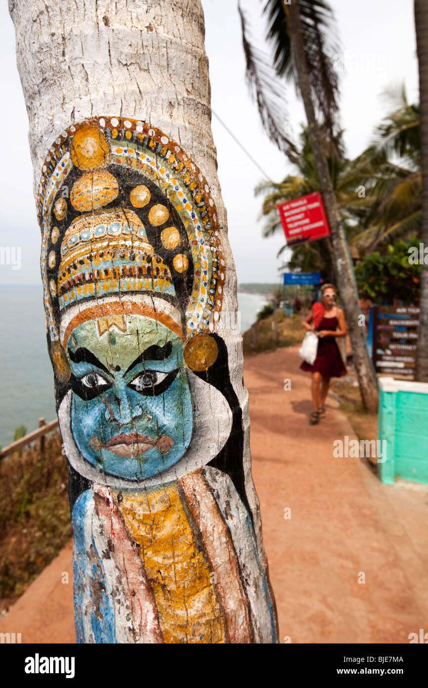 India, Kerala, Varkala, Kathakali dancer figure painted on coconut tree ...