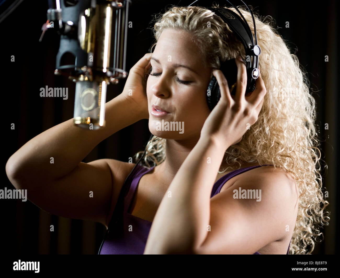 woman in a recording studio Stock Photo - Alamy