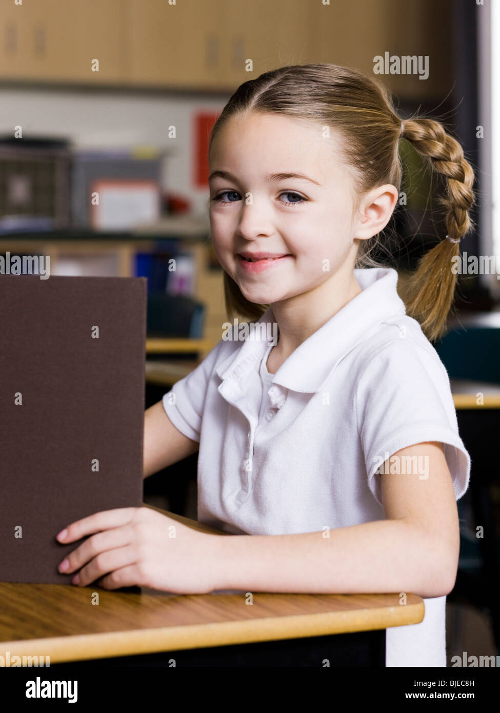 girl in a classroom Stock Photo - Alamy